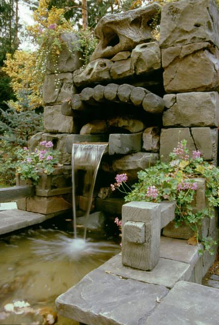 Ornamental waterfall with a basin made from concrete