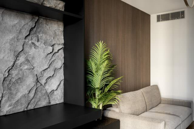 The interior of a young couple's rock-adorned apartment